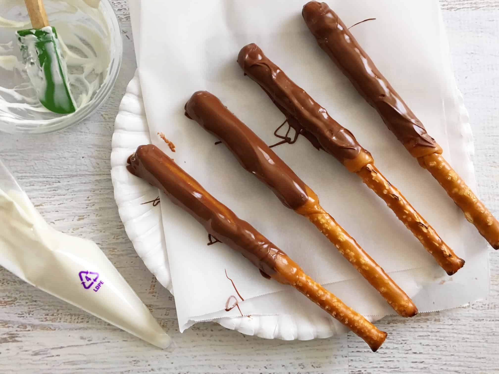 Hand Dipped Caramel Chocolate Covered Pretzel Rods | Teaspoon Of Goodness