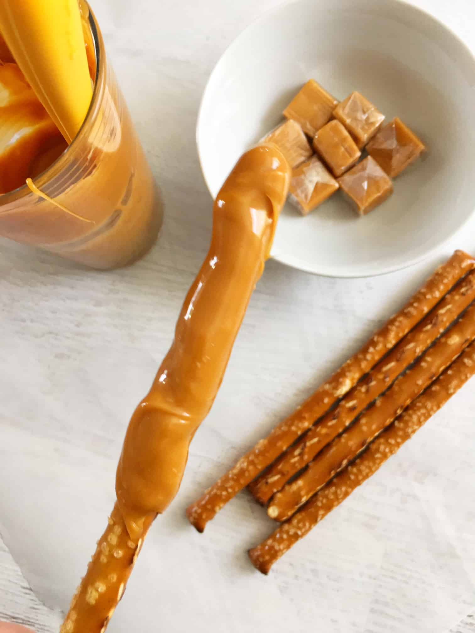 Hand Dipped Caramel Chocolate Covered Pretzel Rods | Teaspoon Of Goodness